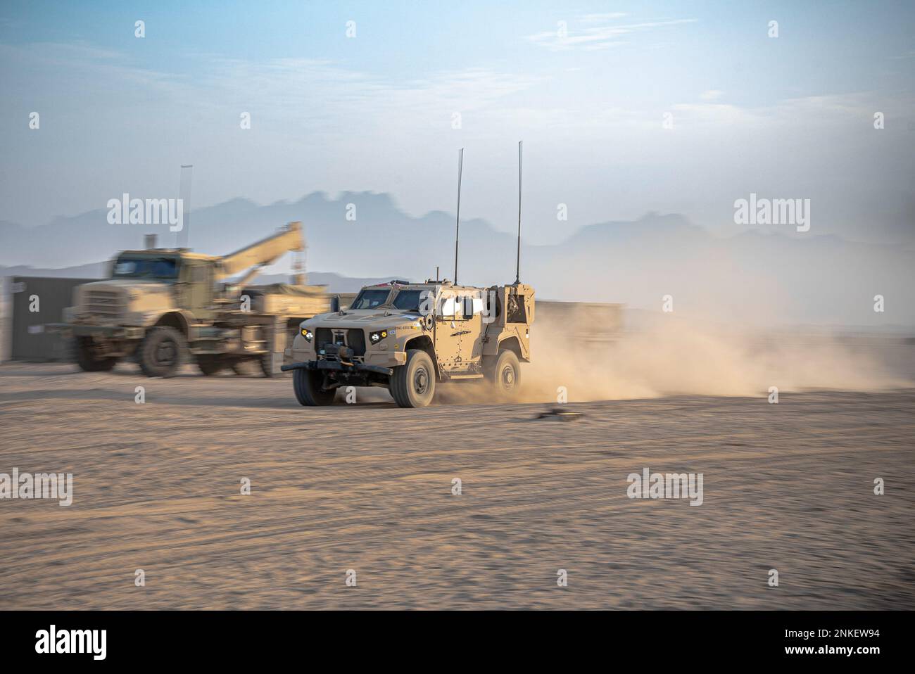 A U.S. Marine Corps Joint Light Tactical Vehicle departs a Logistics ...