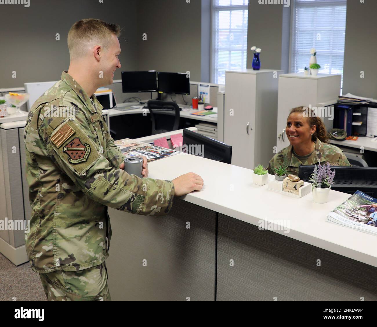 Master Sgt. Dionn Marshall, seated, provides support to Master Sgt ...