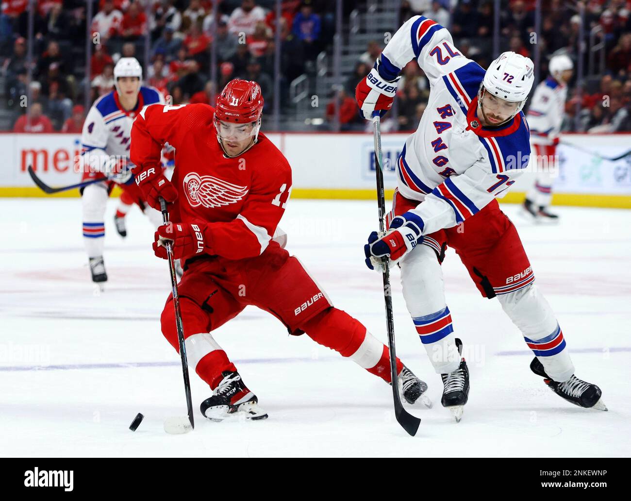 Detroit Red Wings right wing Filip Zadina (11) is pursued by New York ...
