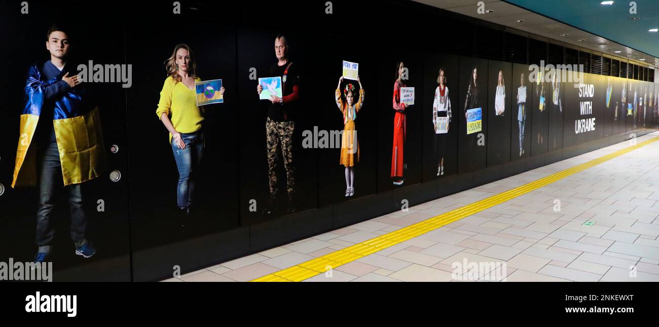 A photo exhibition, Stand with Ukraine, is held at Omotesando station ...