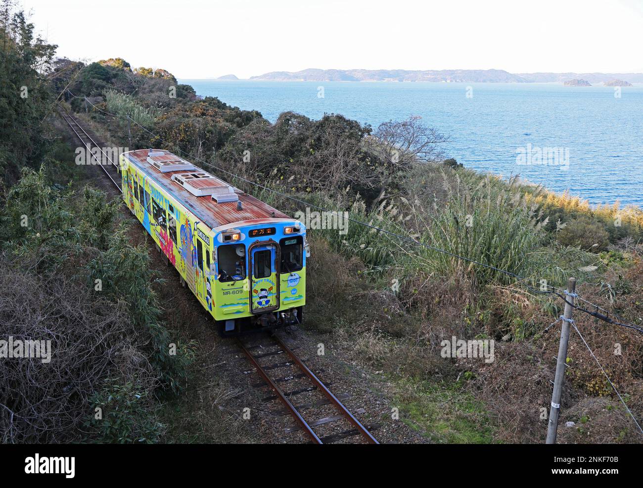 A train of Matsuura Railway runs at Matsuura City, Nagasaki Prefectur ...