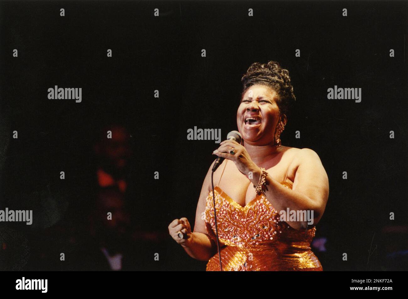 Aretha Franklin performs during a concert at Chastain Park in Atlanta ...