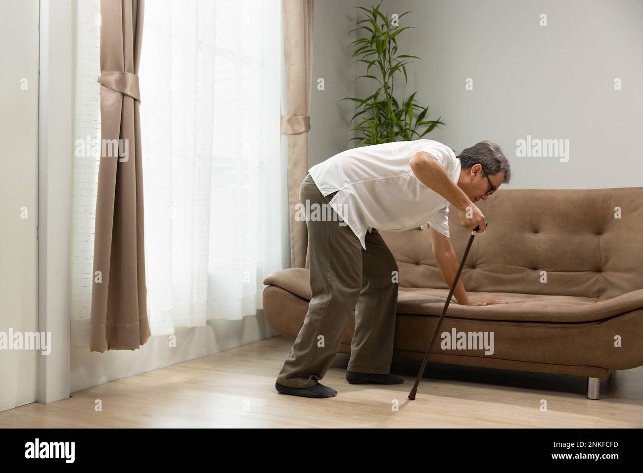 Caregiver takecare older man that having Sarcopenia or muscle loss ...