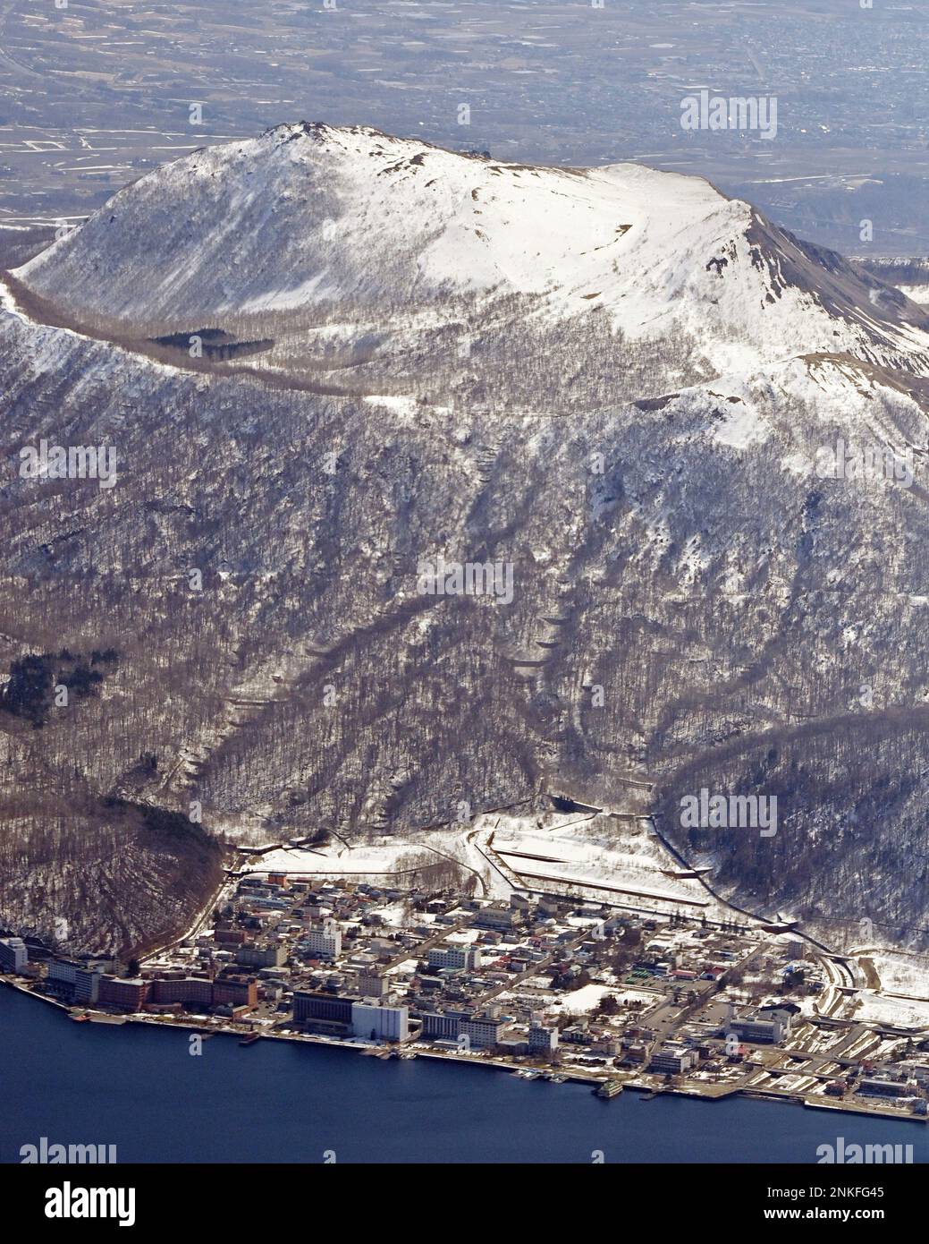 An aerial photo shows Mt. Usu with Lake Toya in Shikotsuko Toya ...