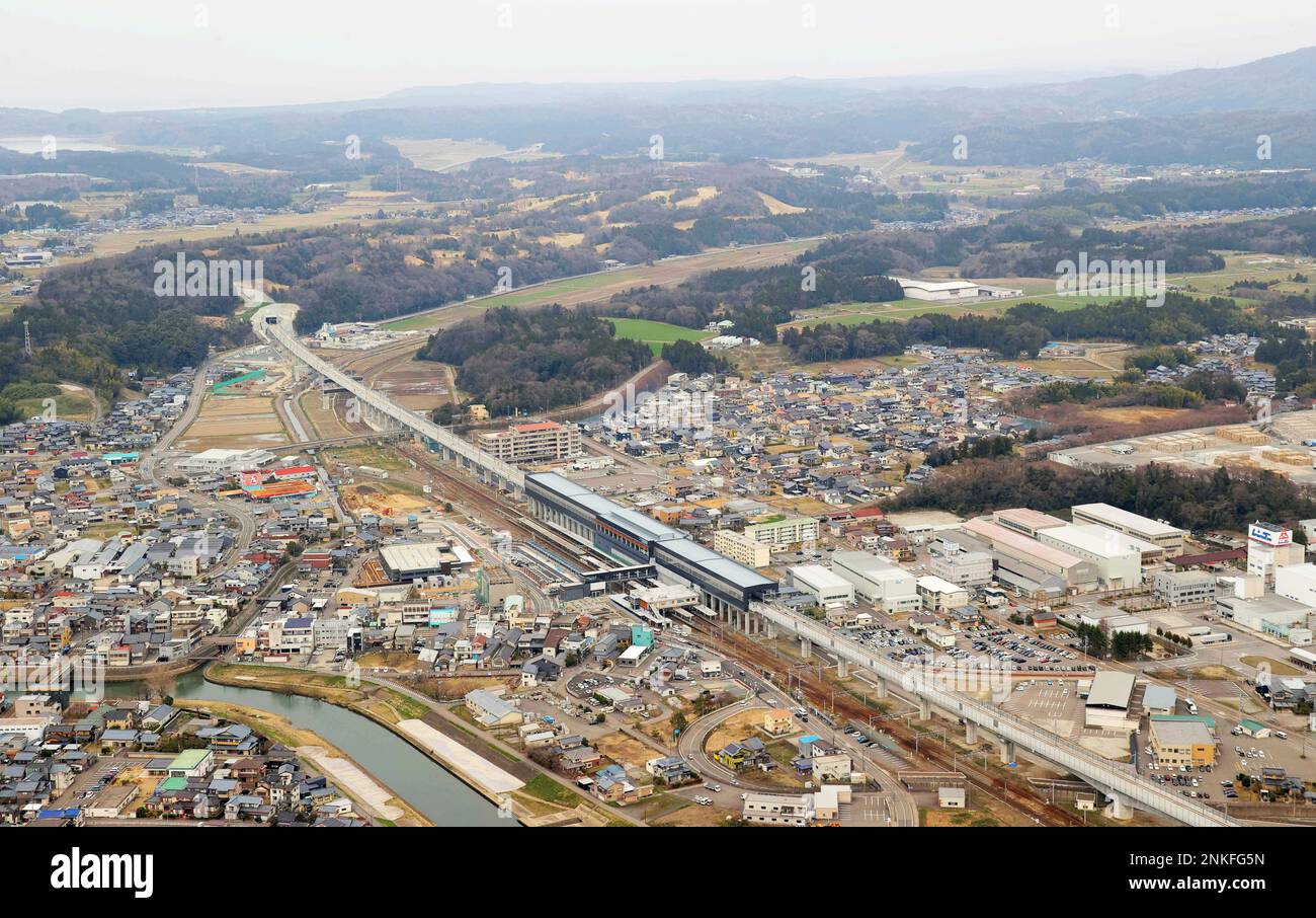 An aerial photo shows the Awara Onsen Station and surrounding area in ...