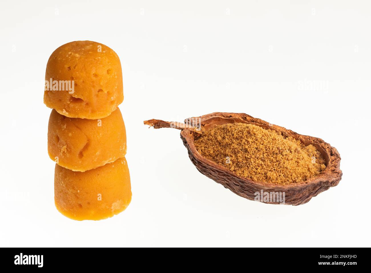 Panela in block and powder - Sugar cane candy Stock Photo - Alamy