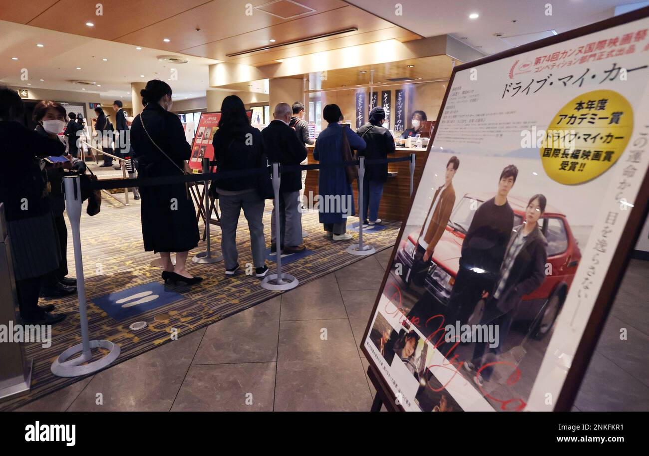 People line to watch the movie "Drive My Car" at a theater in Hiroshima ...