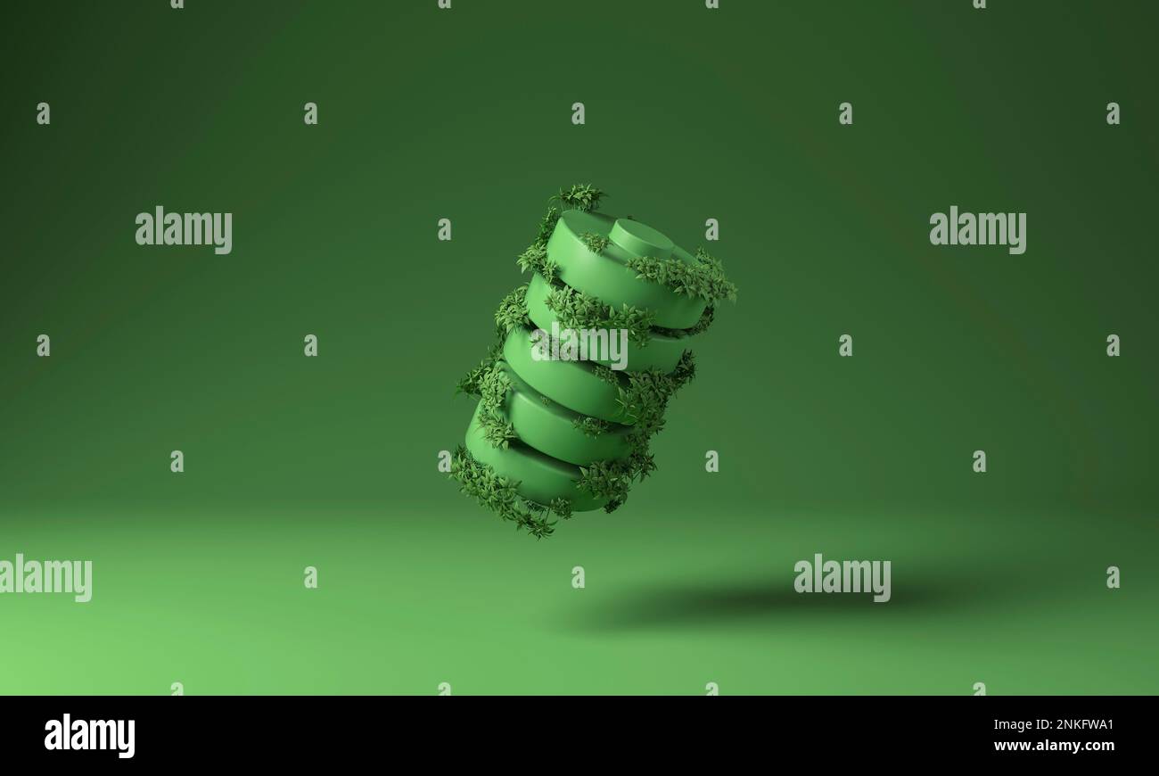 Battery covered in plants against green background Stock Photo - Alamy