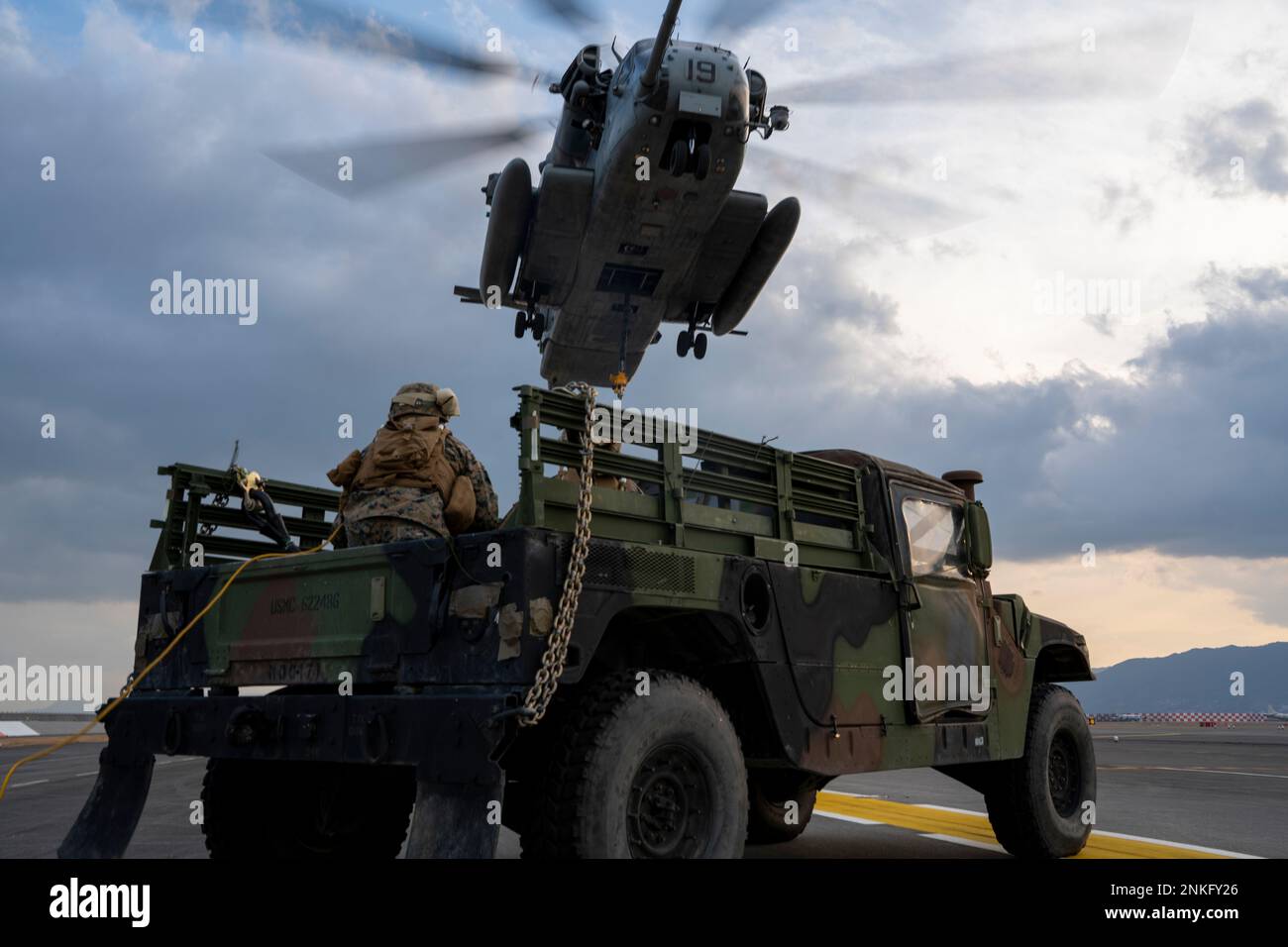 U.S. Marines with Combat Logistics Battalion 31 and a CH-53E Super ...