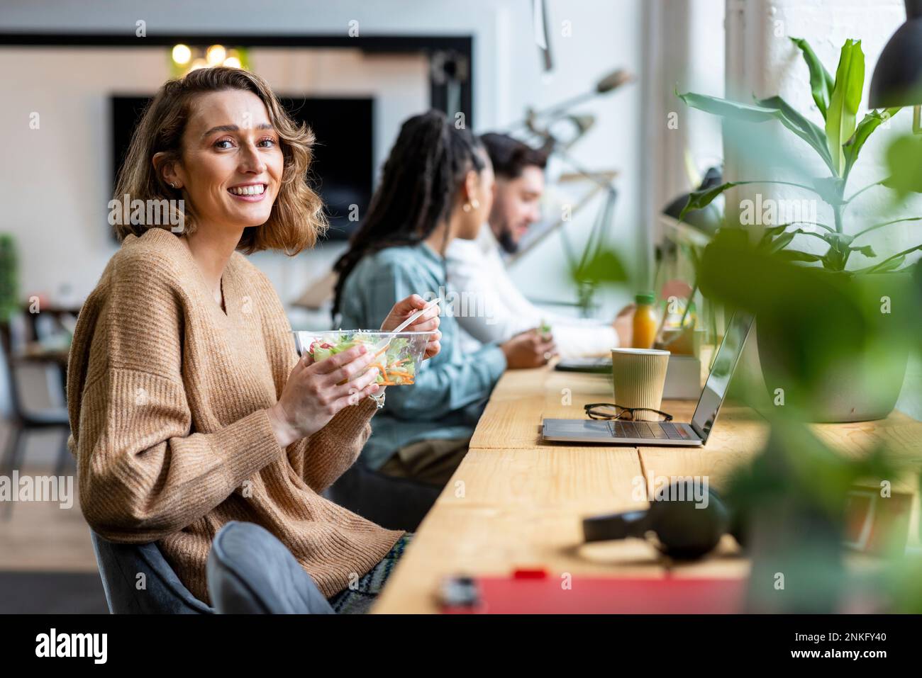 Portrait happy man eating salad hi-res stock photography and images - Alamy
