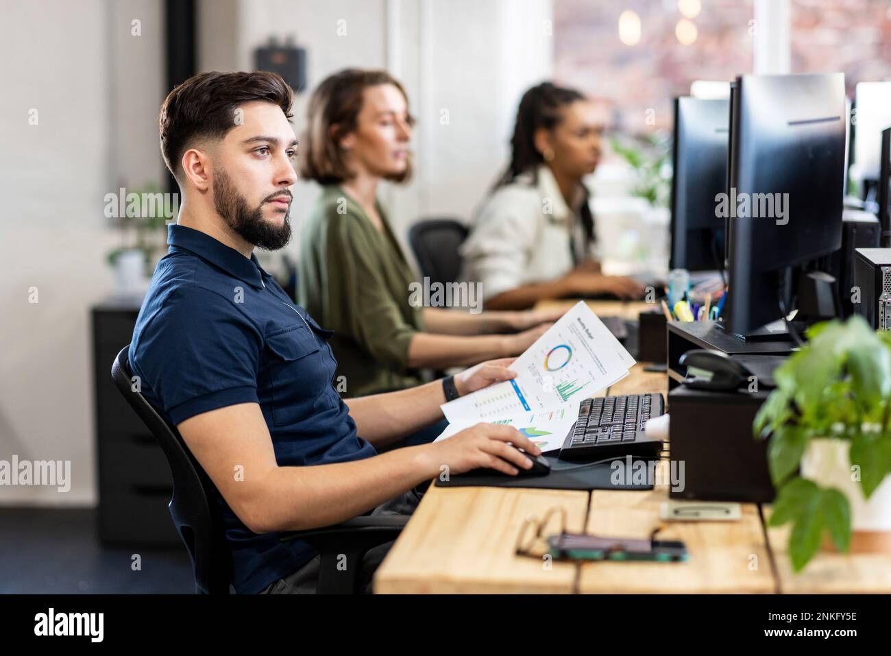 Businessman working charts on hi-res stock photography and images - Alamy