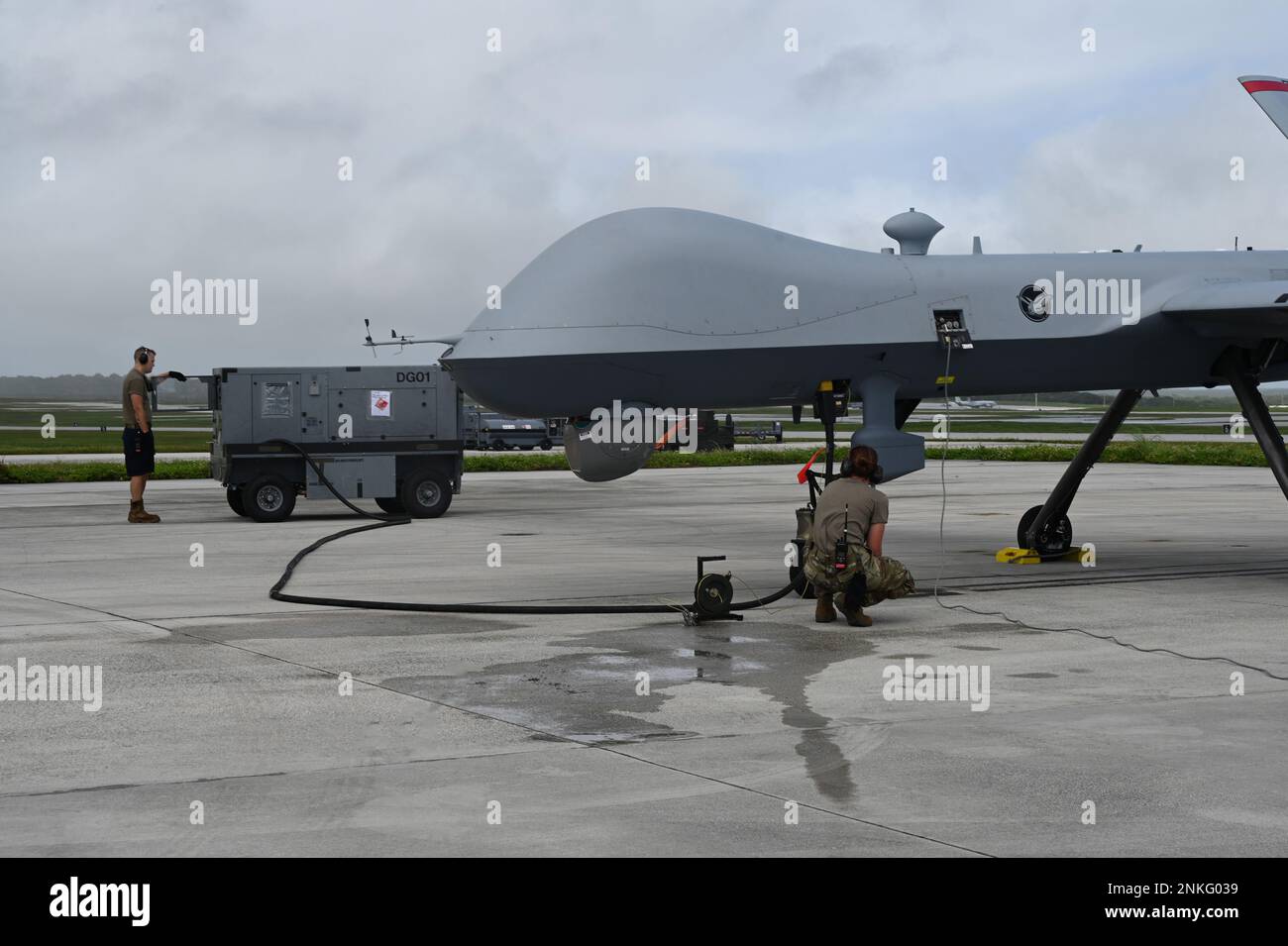 A U.S. Air Force 119th Wing aircraft maintainer prepares a MQ-9 Reaper ...