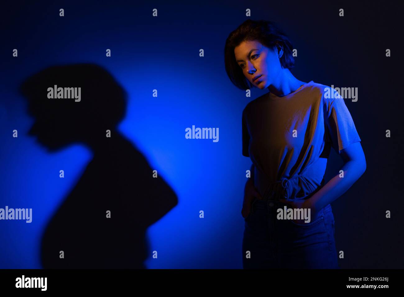 Blue colored lighting young hi-res stock photography and images - Alamy
