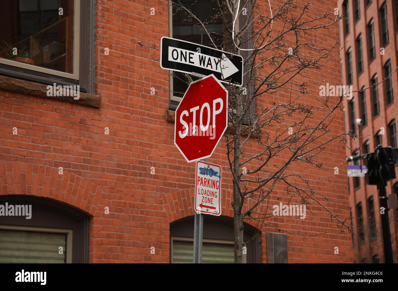 Stop sign in public road warning at intersection and law and order ...