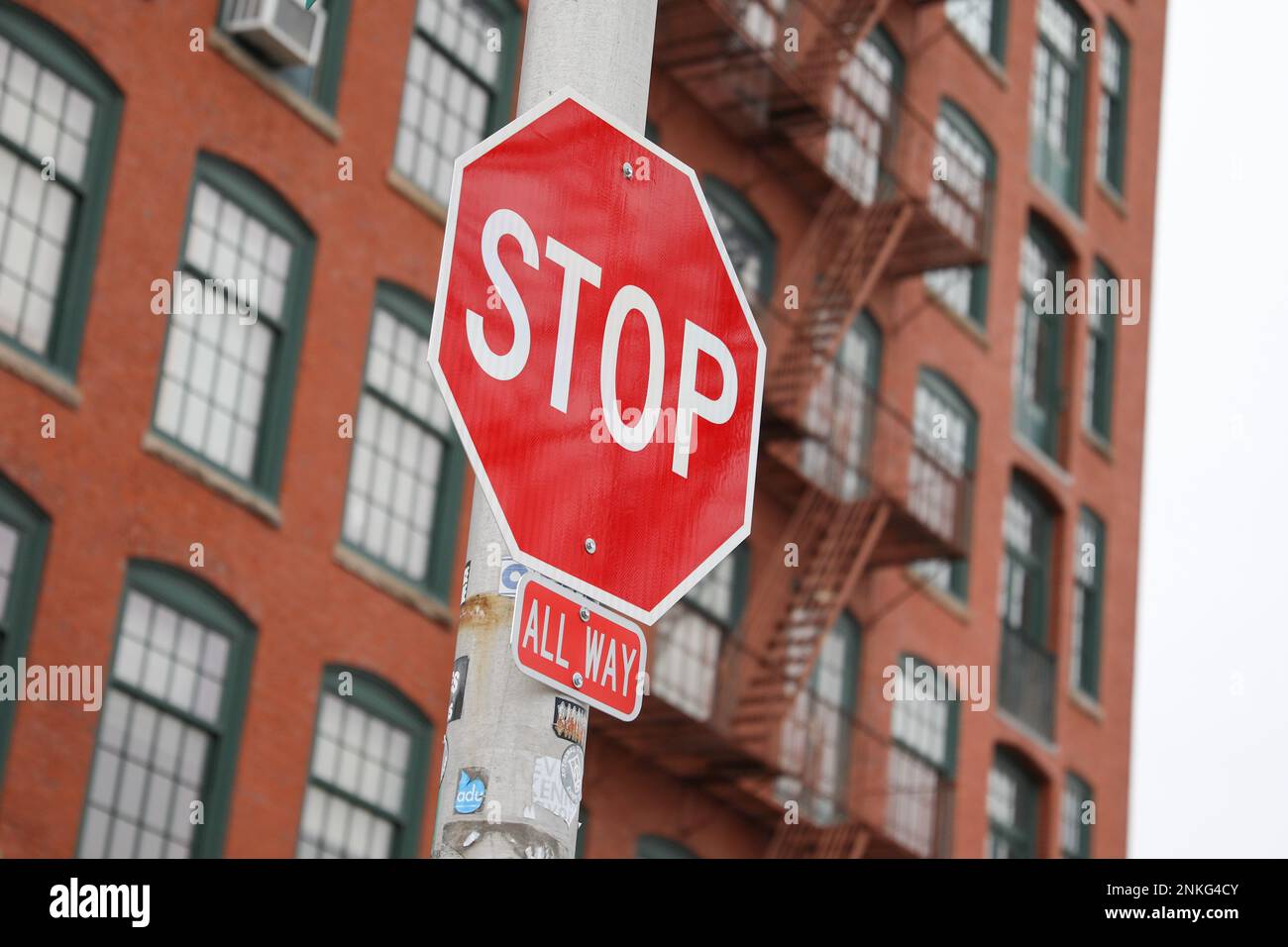 Stop sign in public road warning at intersection and law and order ...