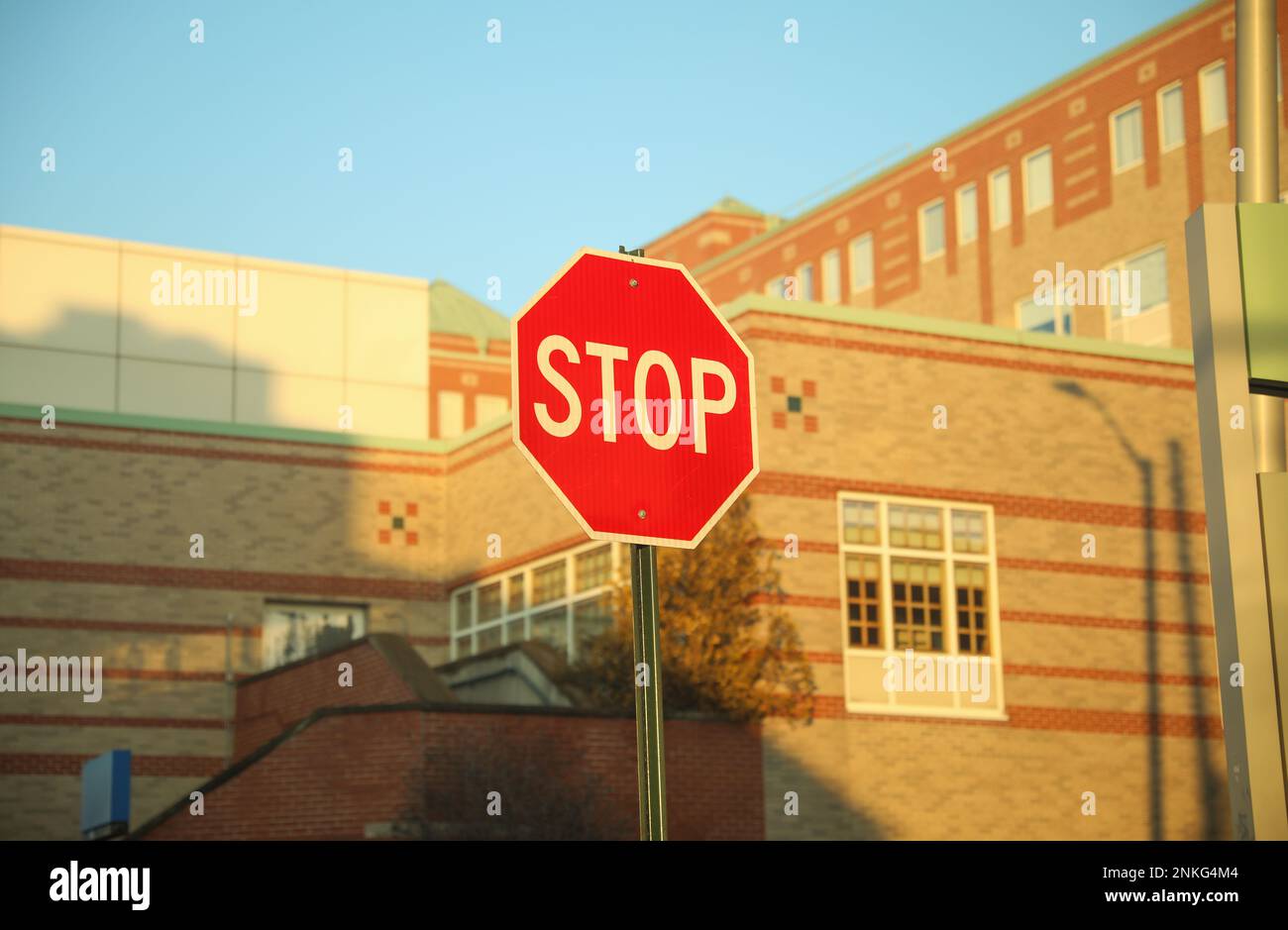 Stop sign in public road warning at intersection and law and order ...
