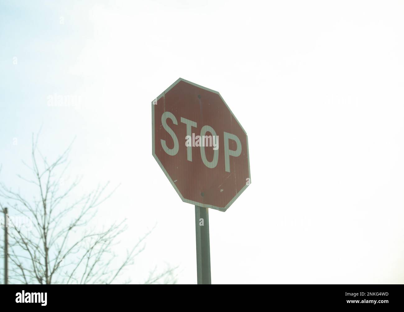 Stop sign in public road warning at intersection and law and order ...