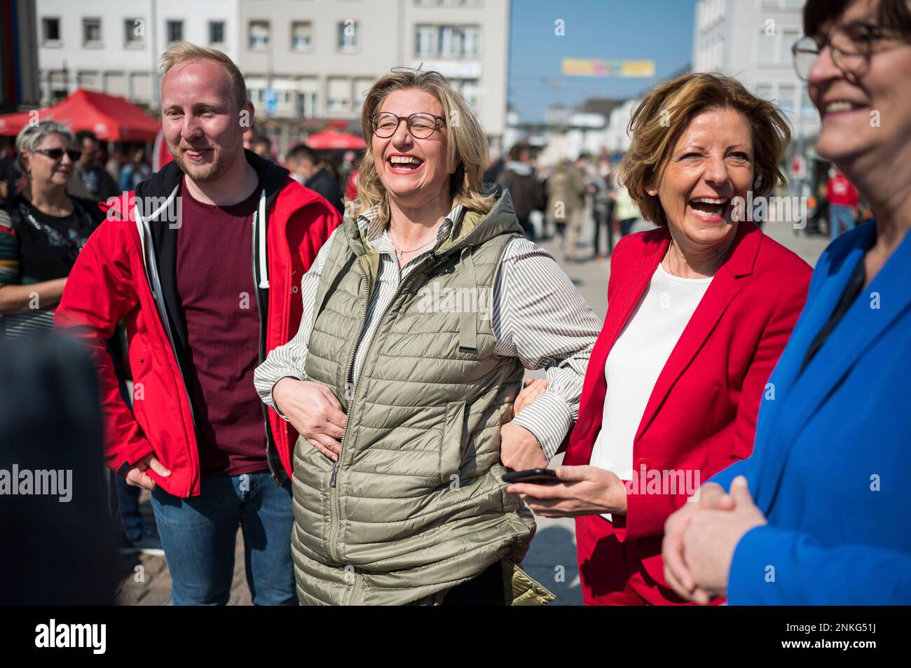 Anke Rehlinger, second left, SPD top candidate for the state election in Saarland, campaigns ...