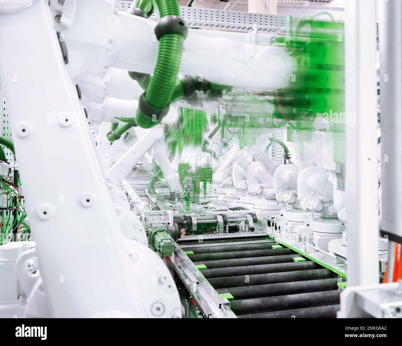 Automated factory using robot arm in production line Stock Photo - Alamy