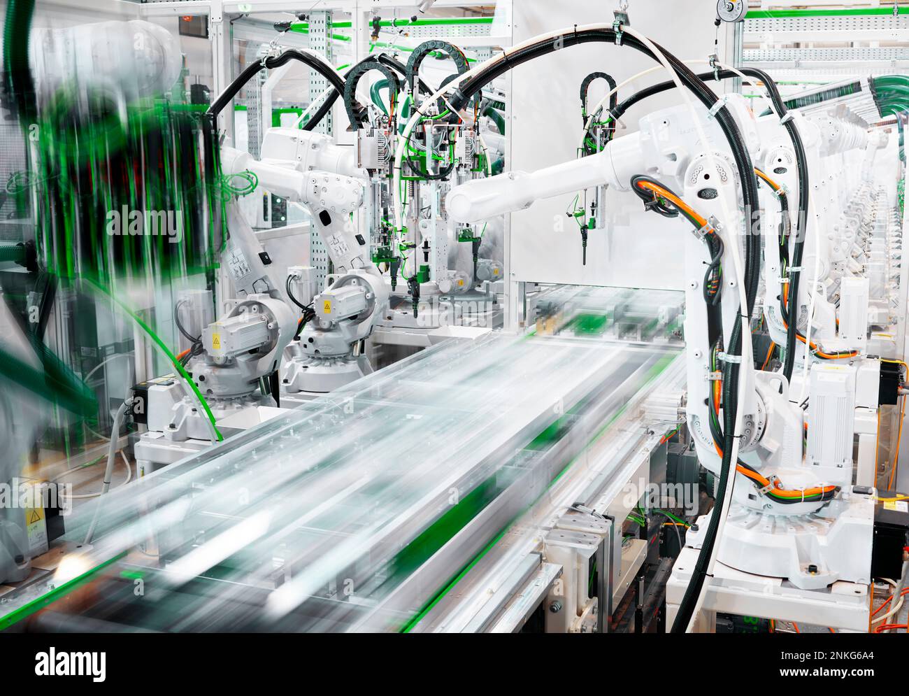Automated factory using robot arm in production line Stock Photo - Alamy