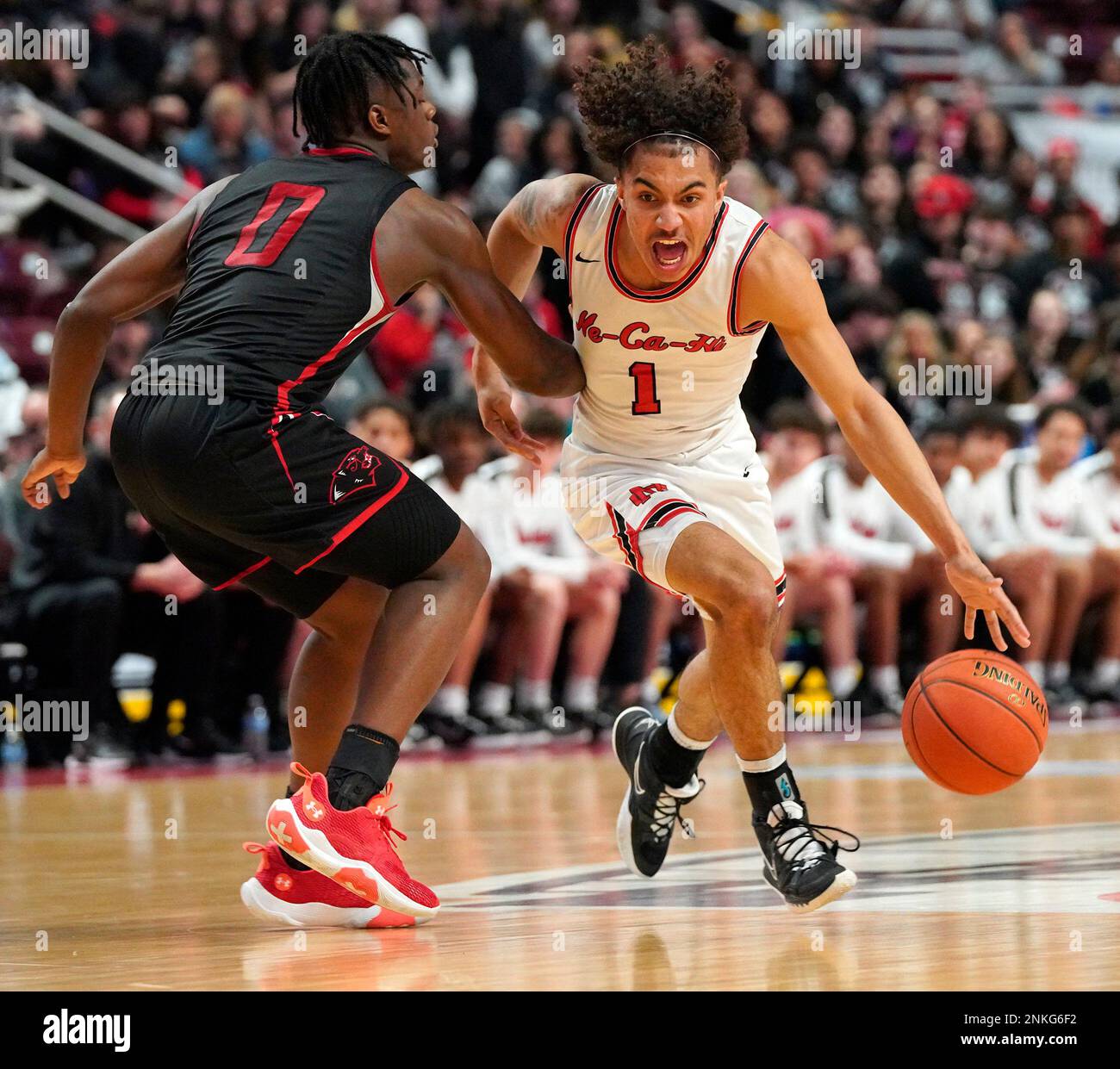 New Castle's Michael Graham tries to get the ball past Imhotep Charter ...