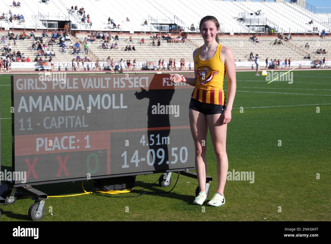 Amanda Moll of Olympia Capital High (Wash.) poses with the scoreboard ...