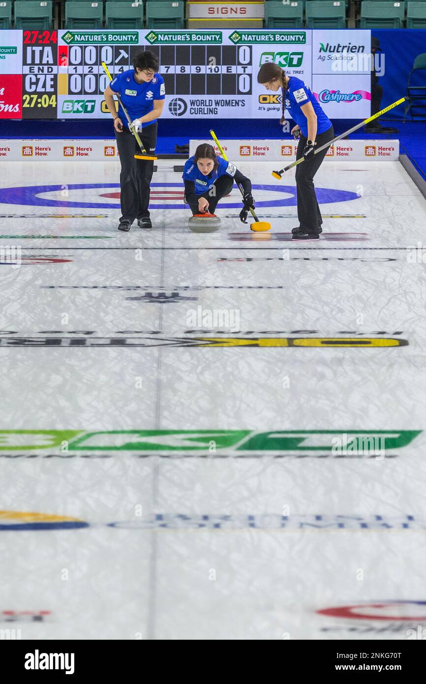 Italy skip Stefania Constantini throws a stone while second Angela ...