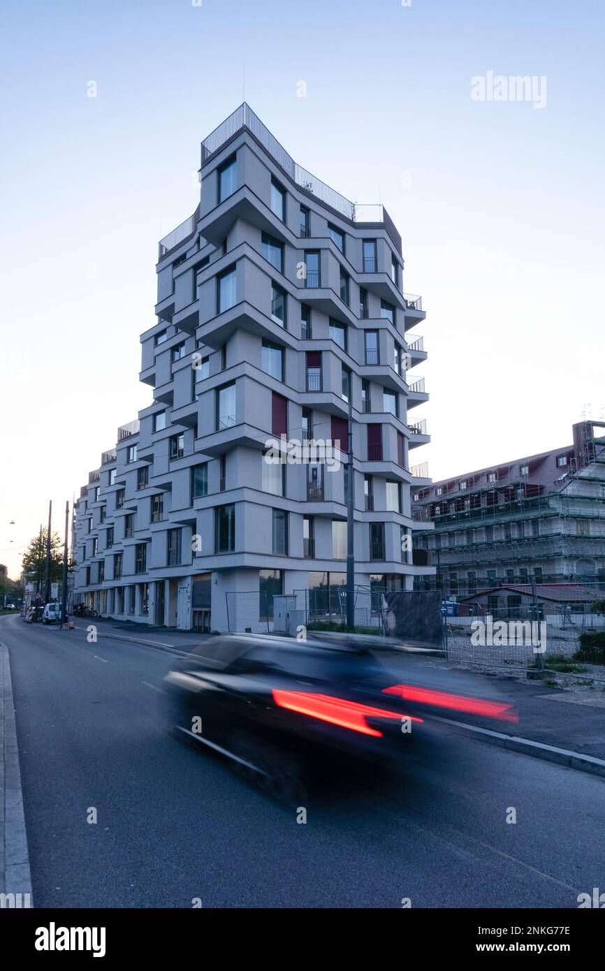Car passing newly built apartment building hi-res stock photography and ...