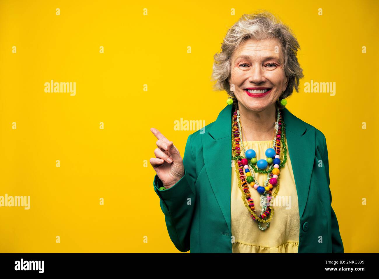 Woman pointing up family hi-res stock photography and images - Alamy
