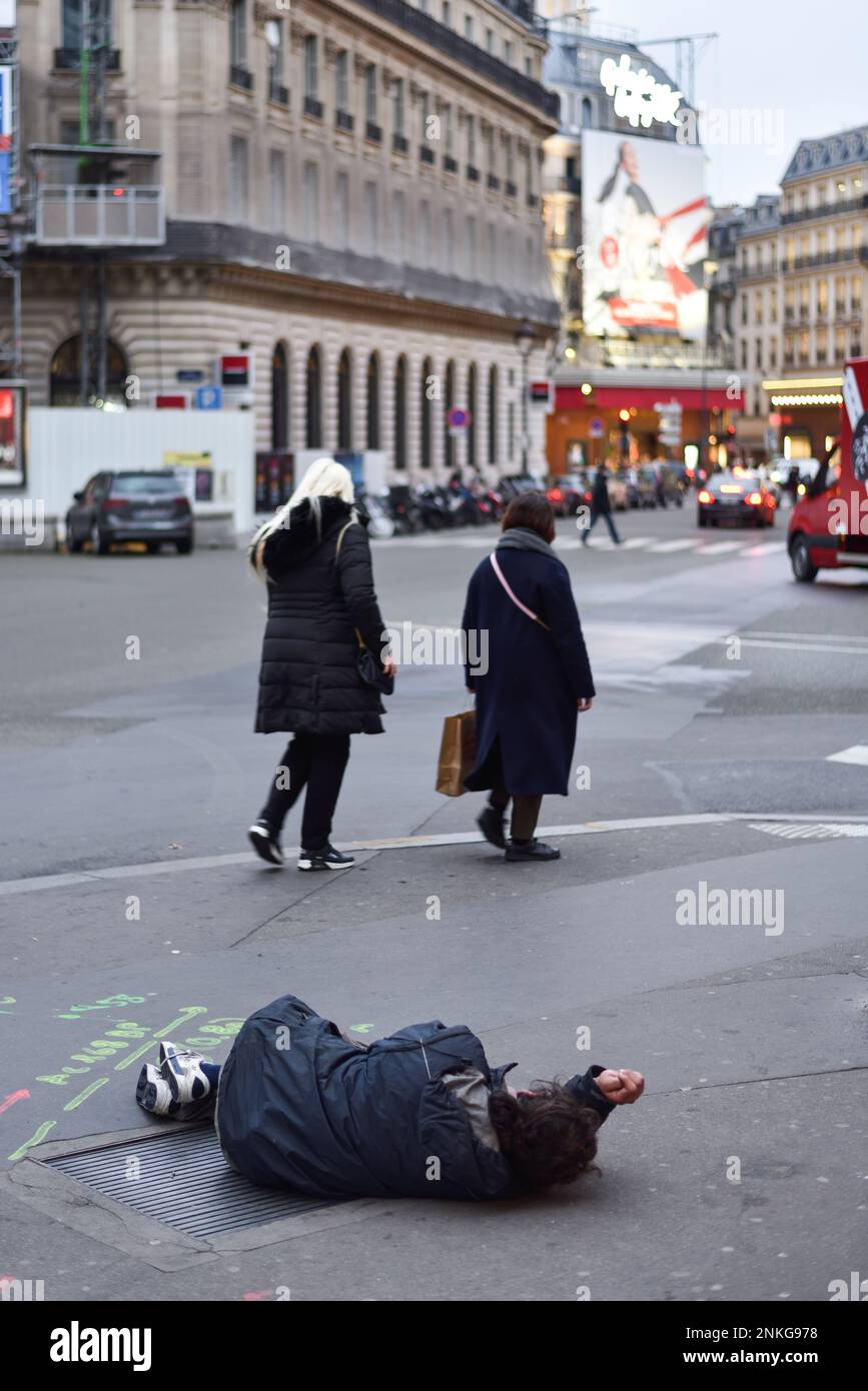Homeless Man on Sidewalk in Paris, France Stock Photo - Alamy