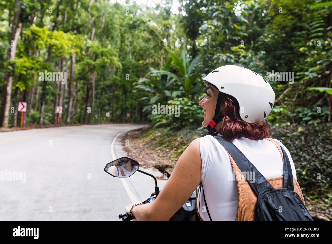Rear view riding motorcycle hi-res stock photography and images - Alamy