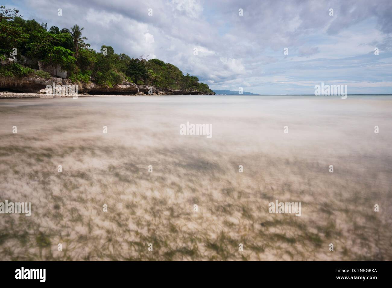 Cloudy sky mountain beach hi-res stock photography and images - Alamy
