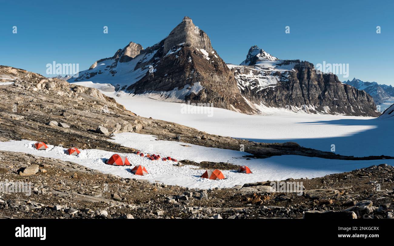 Tents on snow covered mountain under blue sky at Schweizerland Alps, Greenland Stock Photo - Alamy