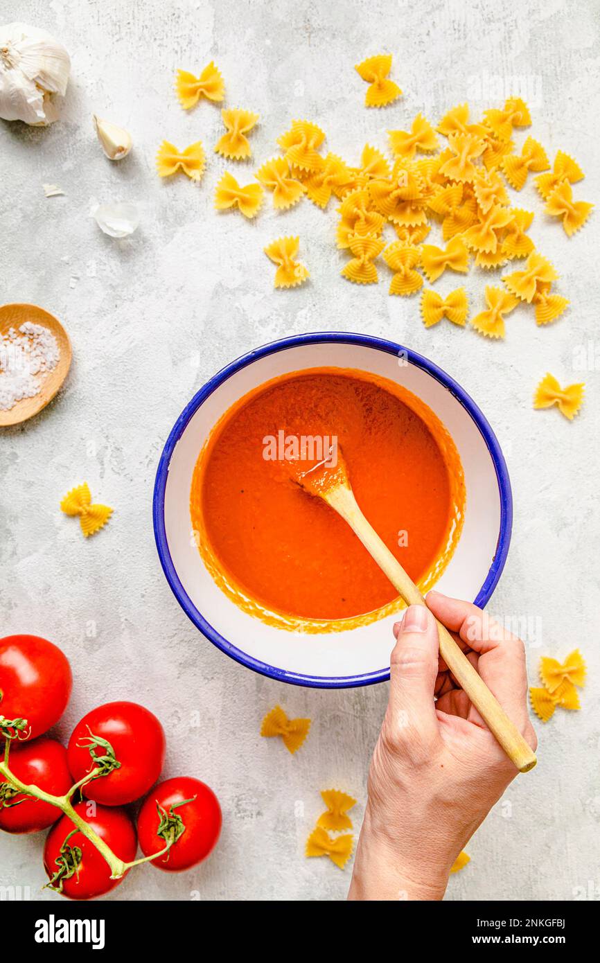 Female hand preparing vegetable hi-res stock photography and images - Alamy