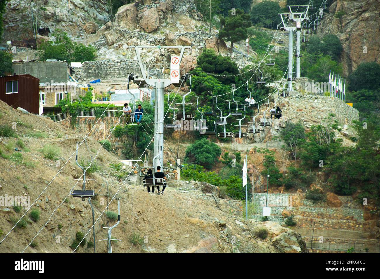 Tehran, Iran-28th may, 2022: tourist sit in cableway car go up to ...