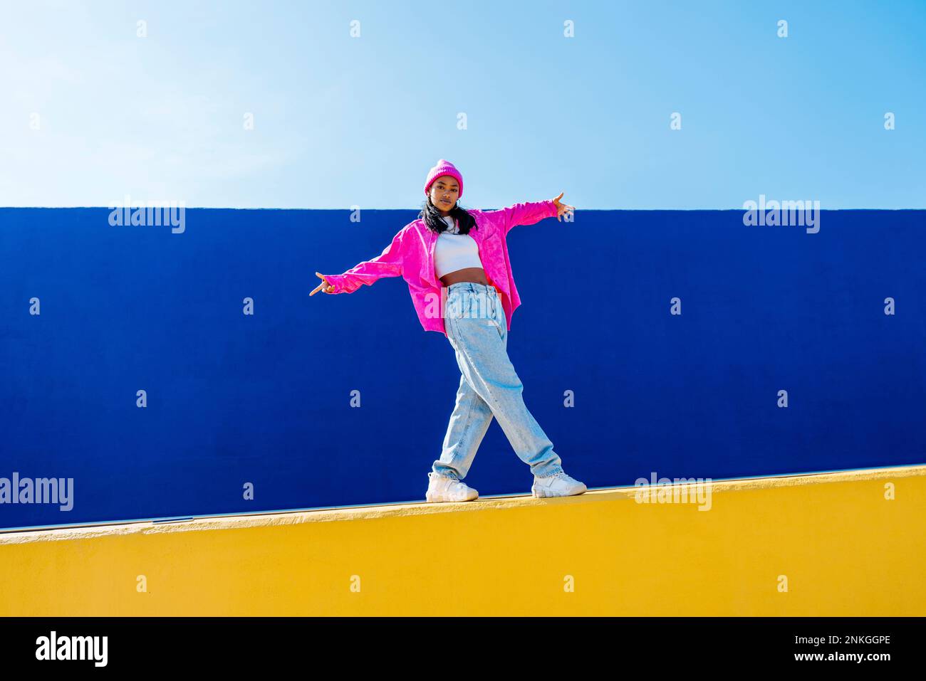 Young dancer enjoying dancing on wall Stock Photo - Alamy