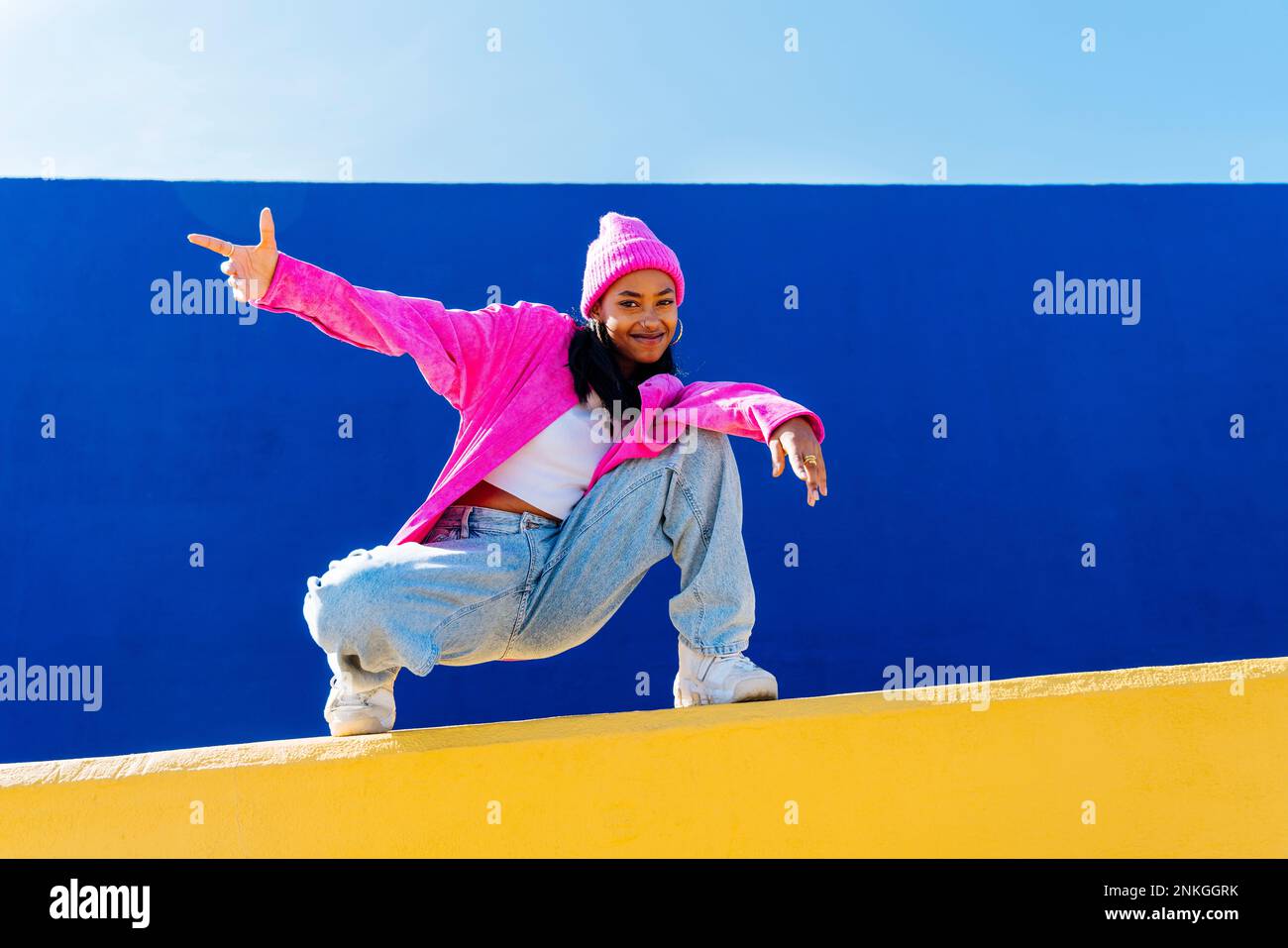 Crouching dance hi-res stock photography and images - Alamy