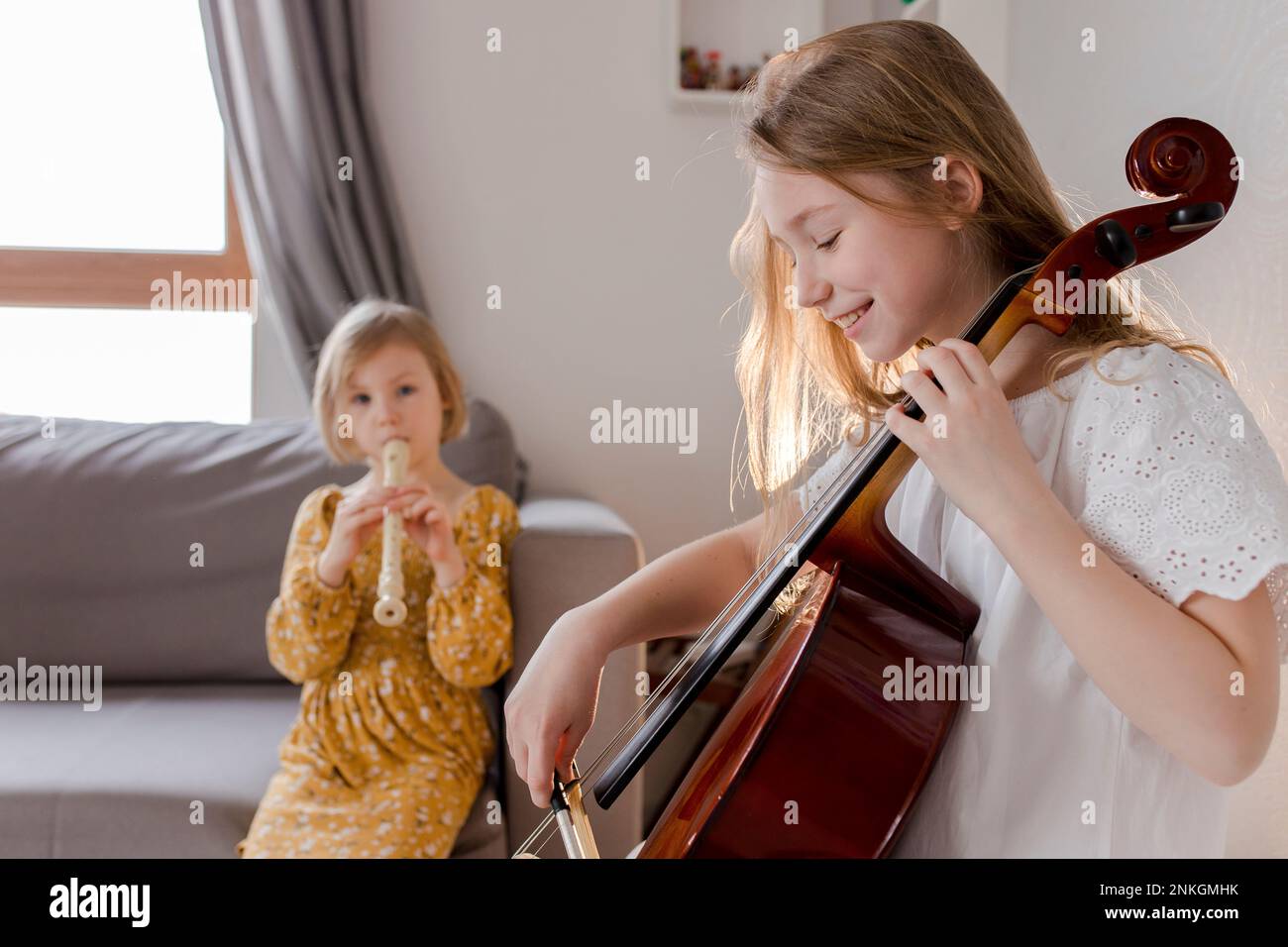 Girls music instruments on hi-res stock photography and images - Alamy