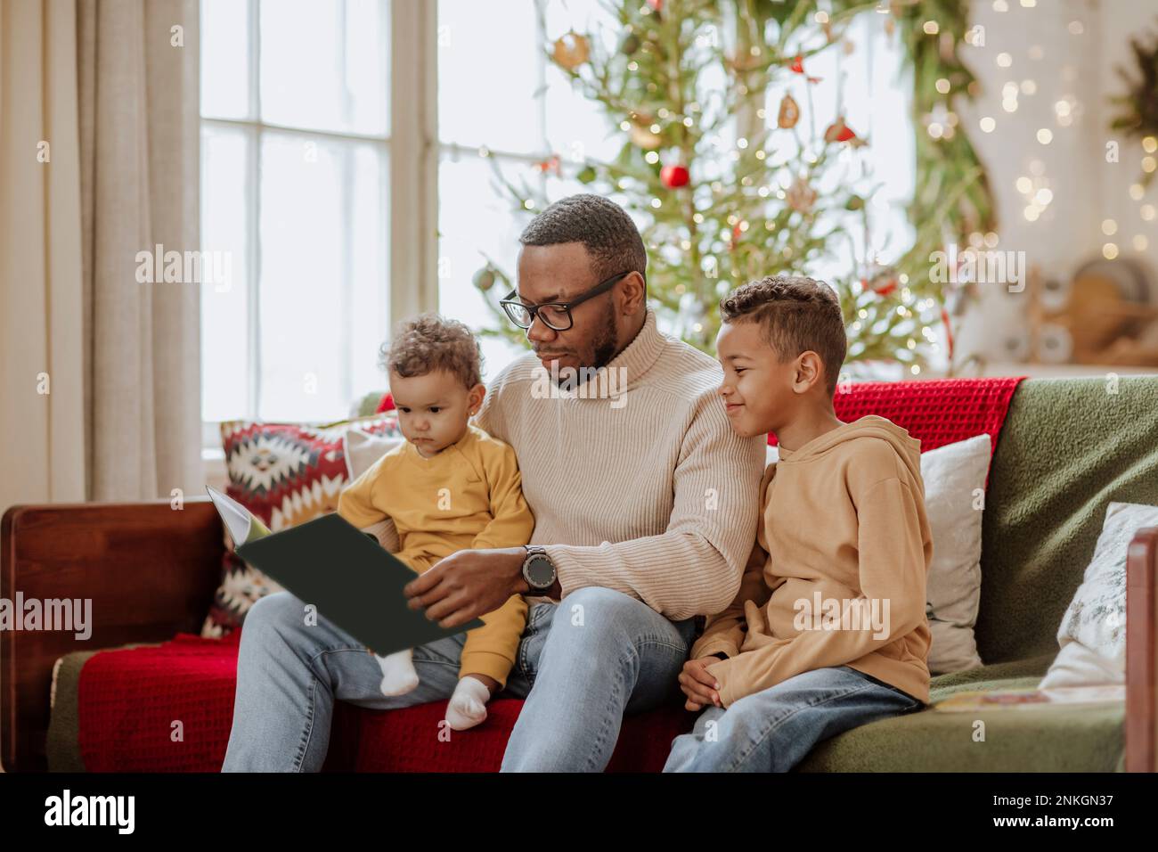Father christmas reading hi-res stock photography and images - Alamy