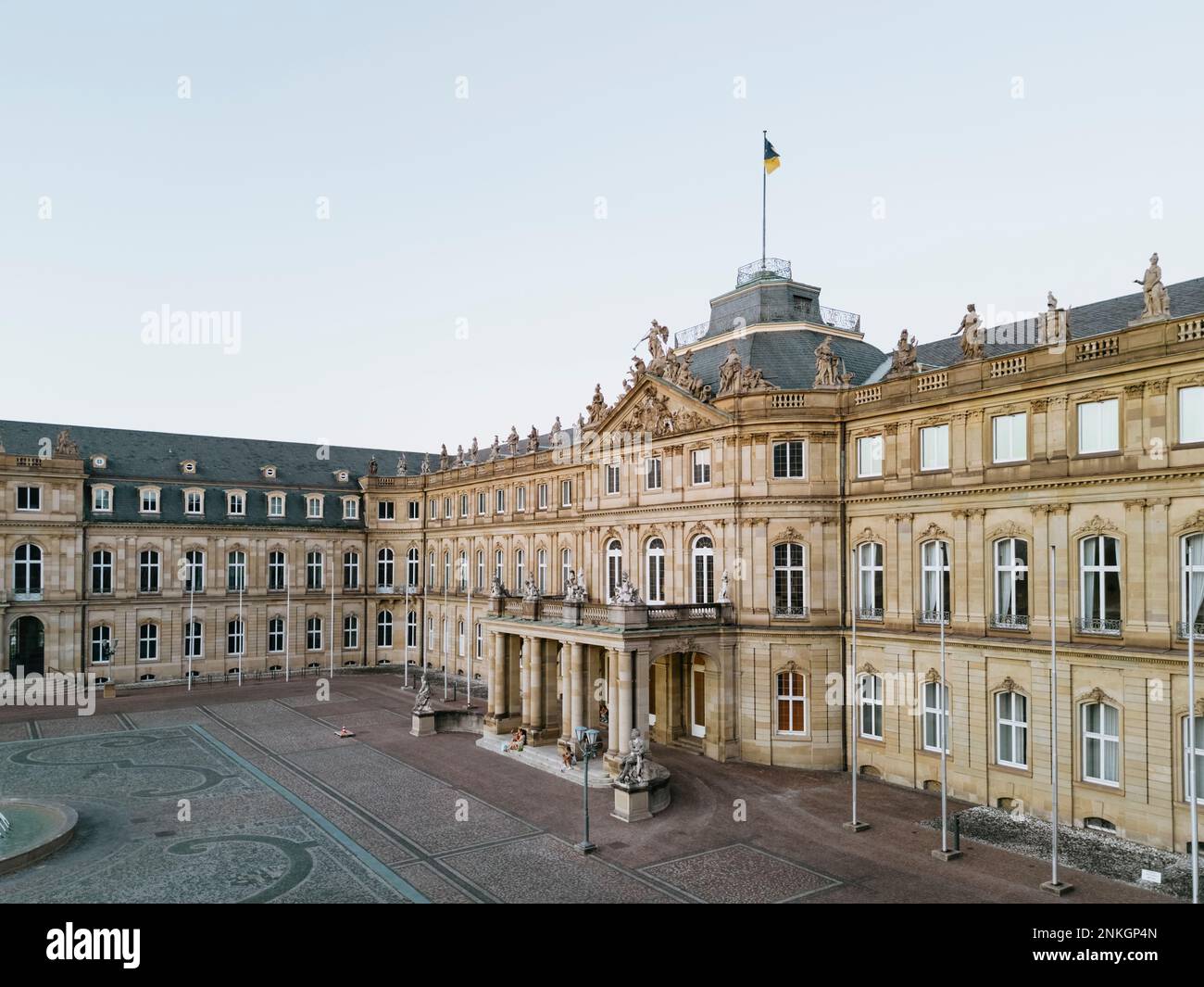 New Palace with German flag at sunset, Stuttgart, Germany Stock Photo ...