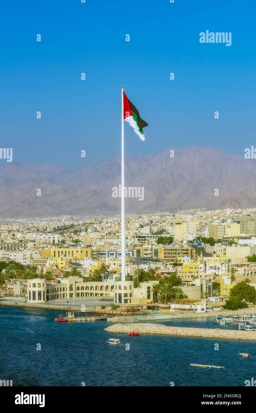 Jordanian Flag at Aqaba seaport on sunny day Stock Photo - Alamy