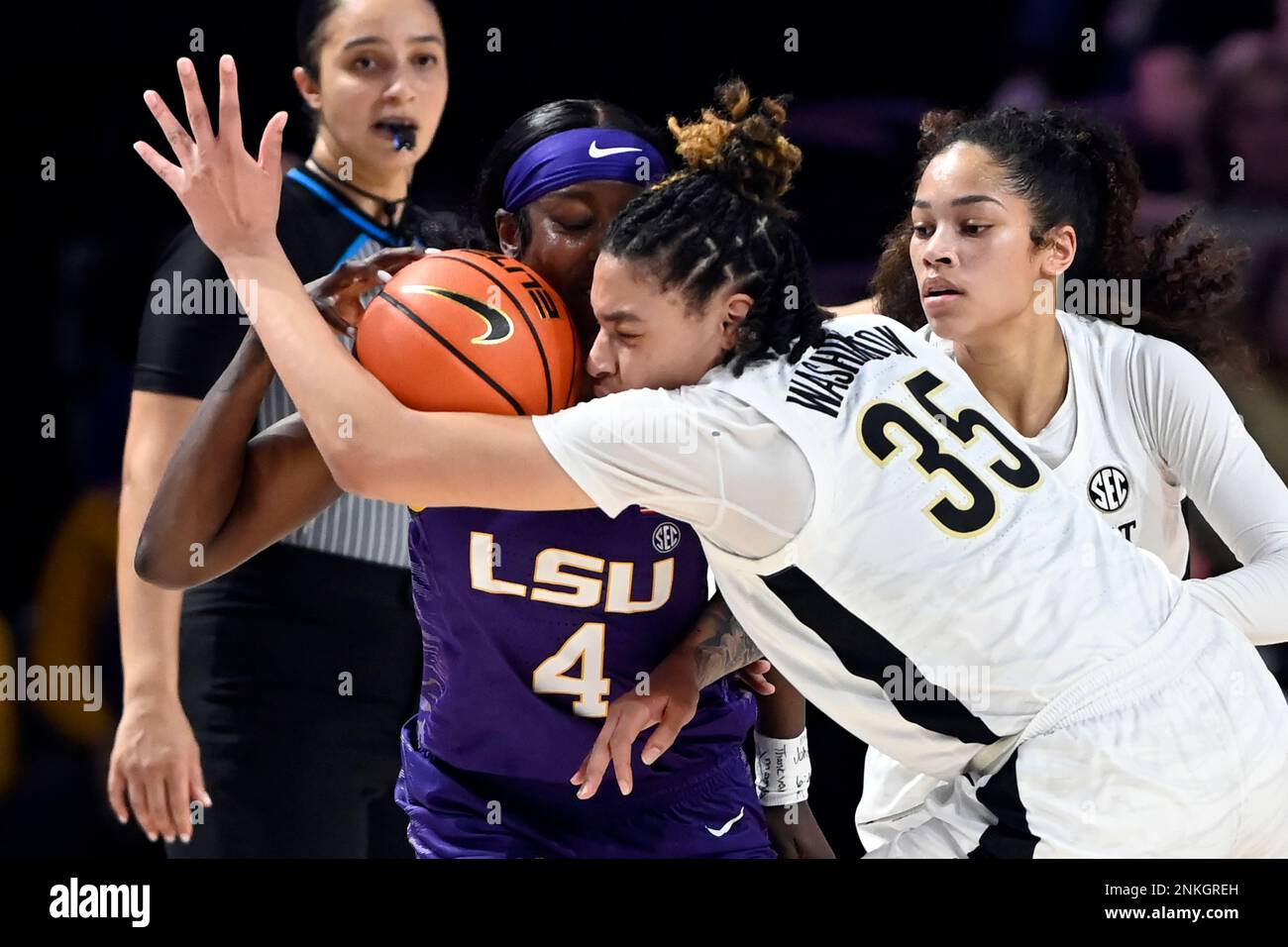 Vanderbilt forward Sacha Washington (35) collides with LSU guard Flau ...
