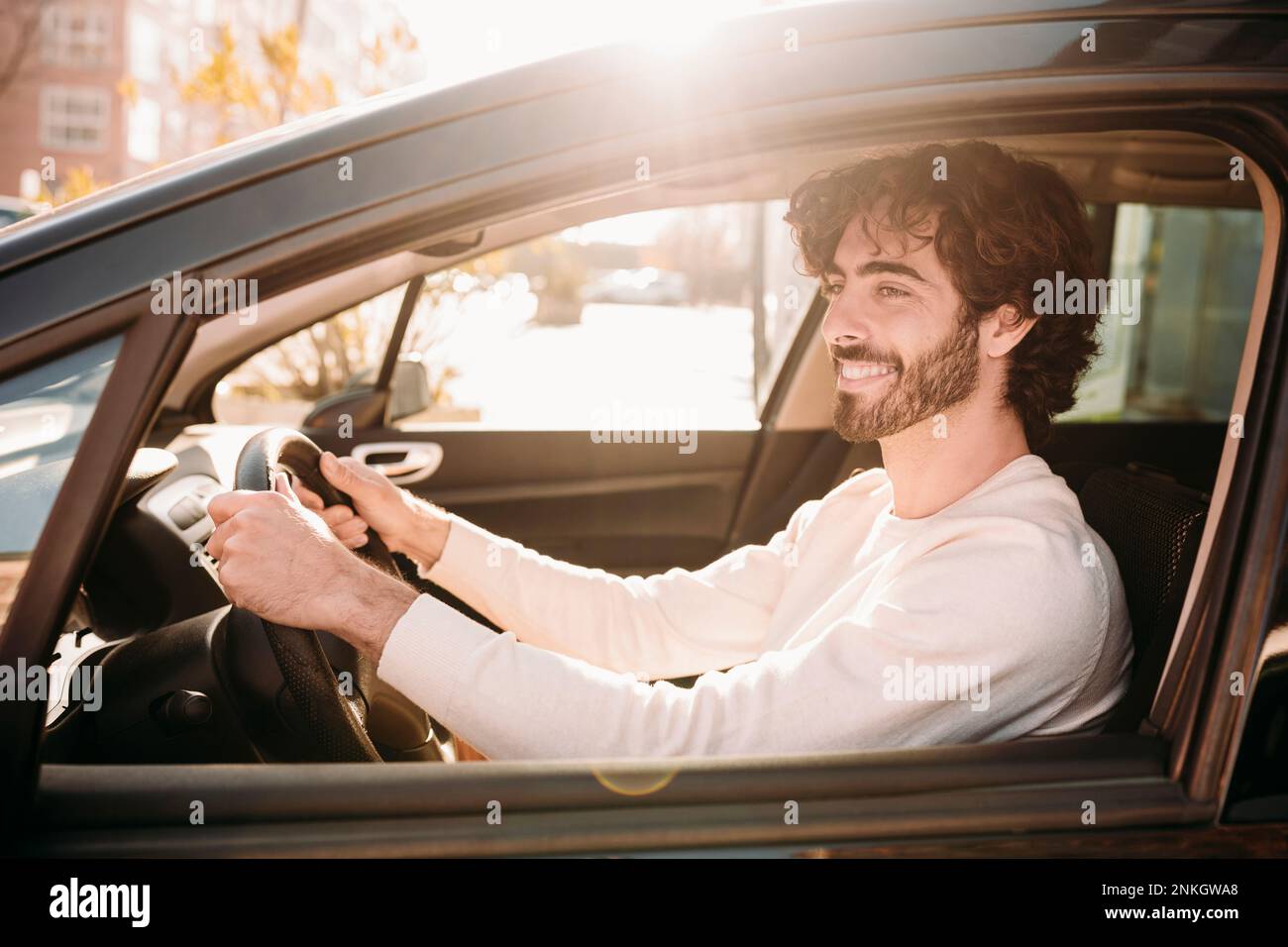 Happy man driving car hi-res stock photography and images - Alamy