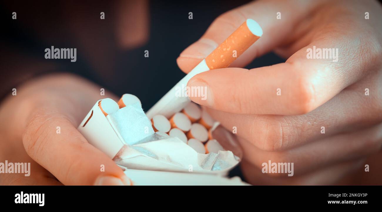 Male hands hold a pack of cigarettes, closeup view Stock Photo - Alamy