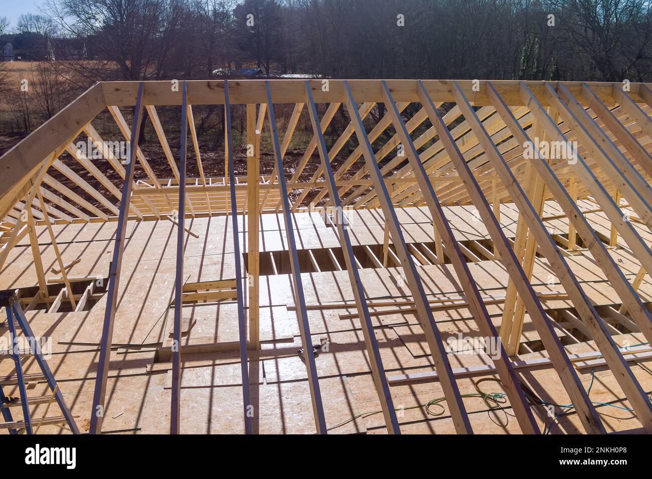Wooden roofing framework consists of trusses beams were built while ...