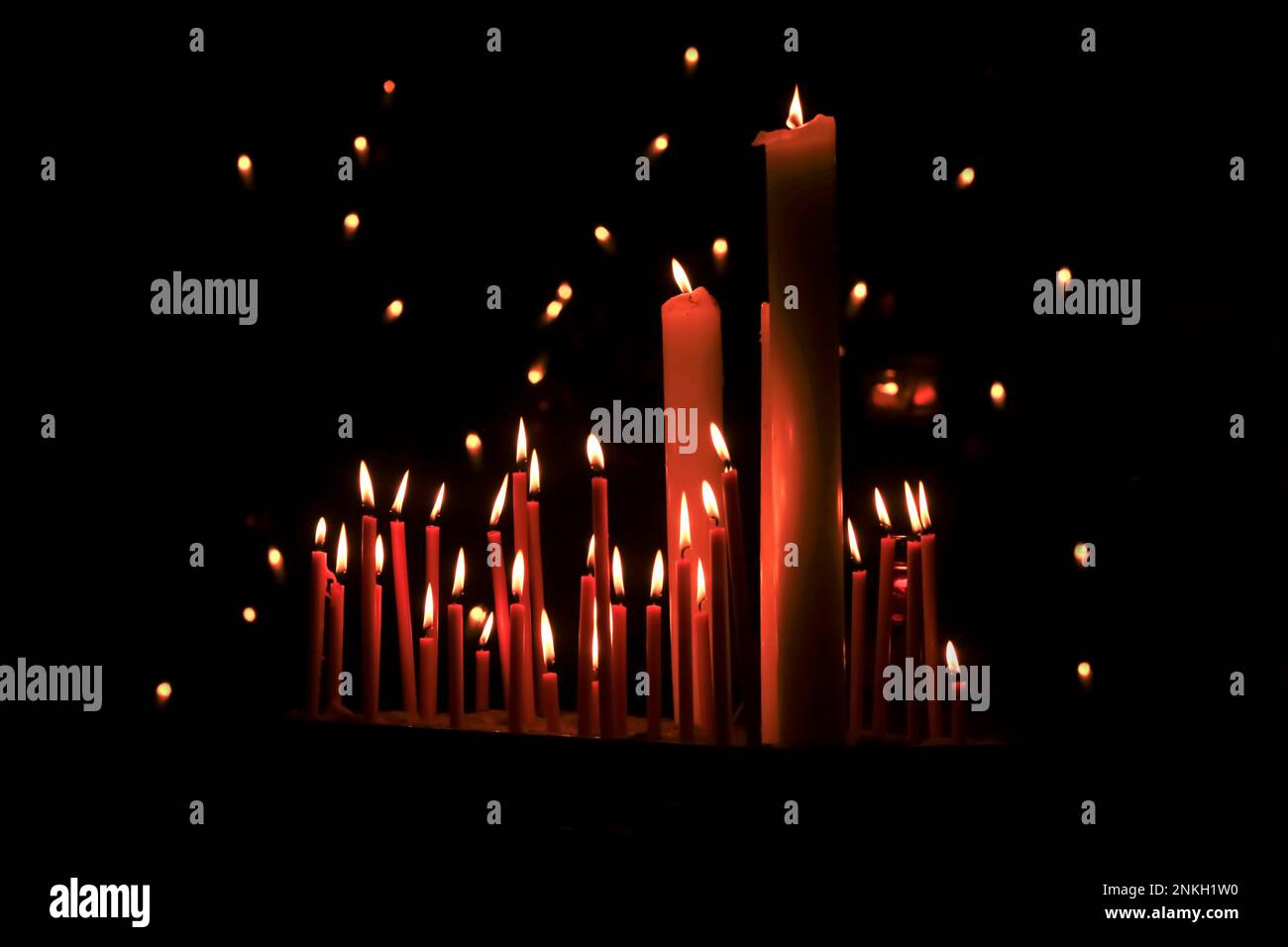 Studio shoot of red burning candles Stock Photo - Alamy