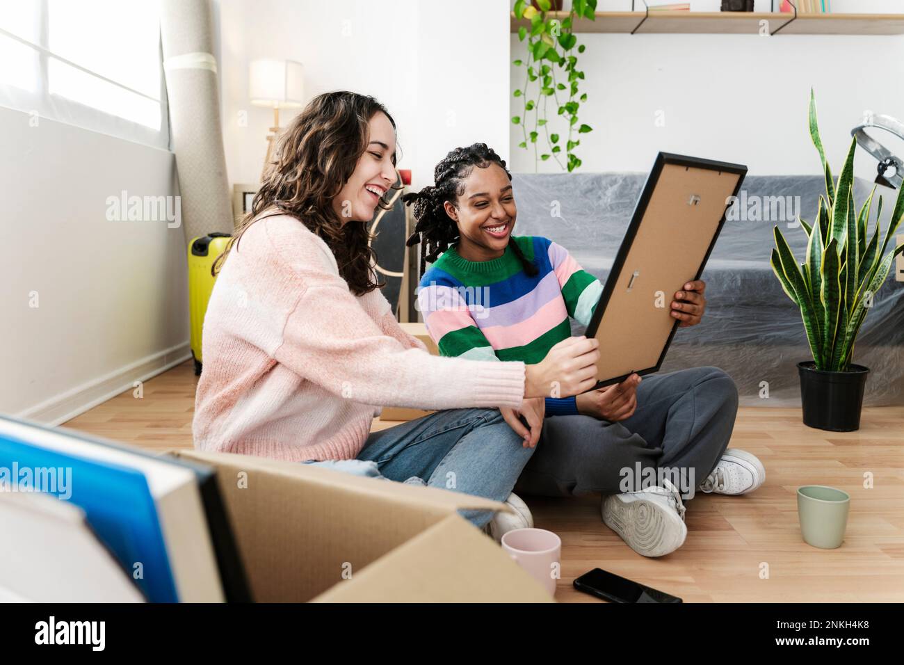 Looking at photo frame hi-res stock photography and images - Alamy