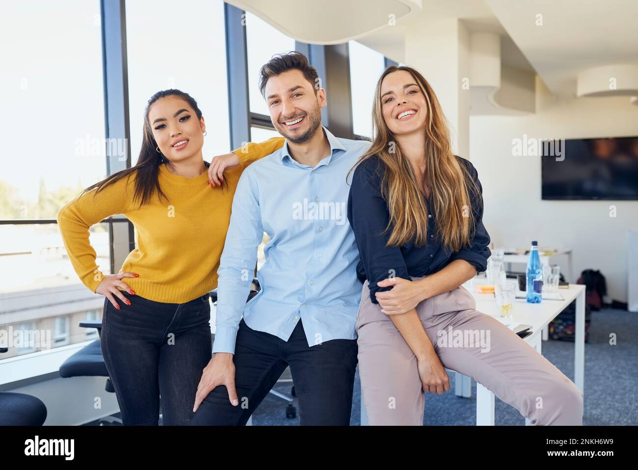 Happy asian man sitting workplace hi-res stock photography and images ...