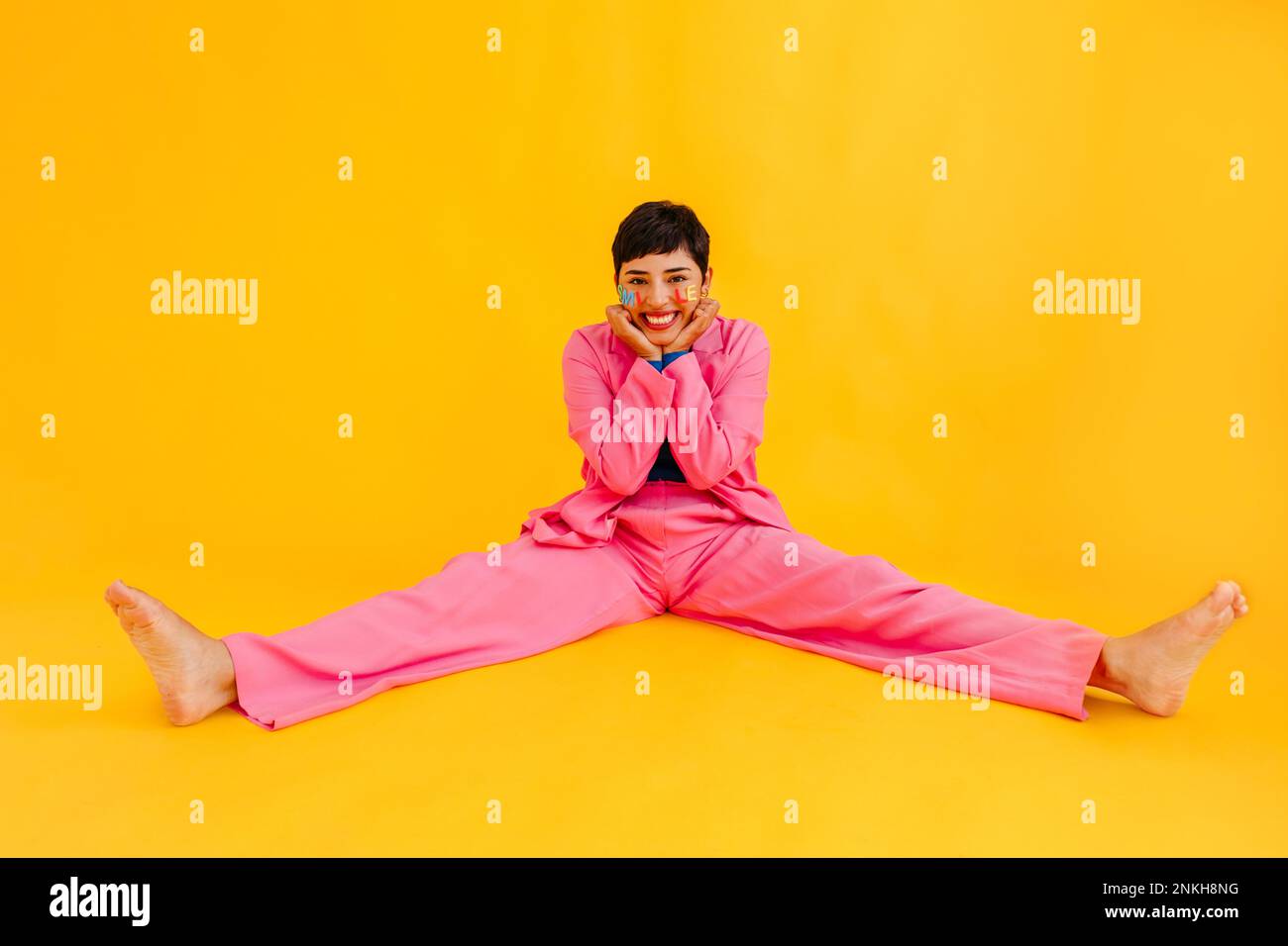 Sitting with legs apart hi-res stock photography and images - Alamy