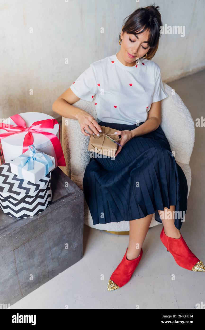 Woman stack gift box on hi-res stock photography and images - Alamy